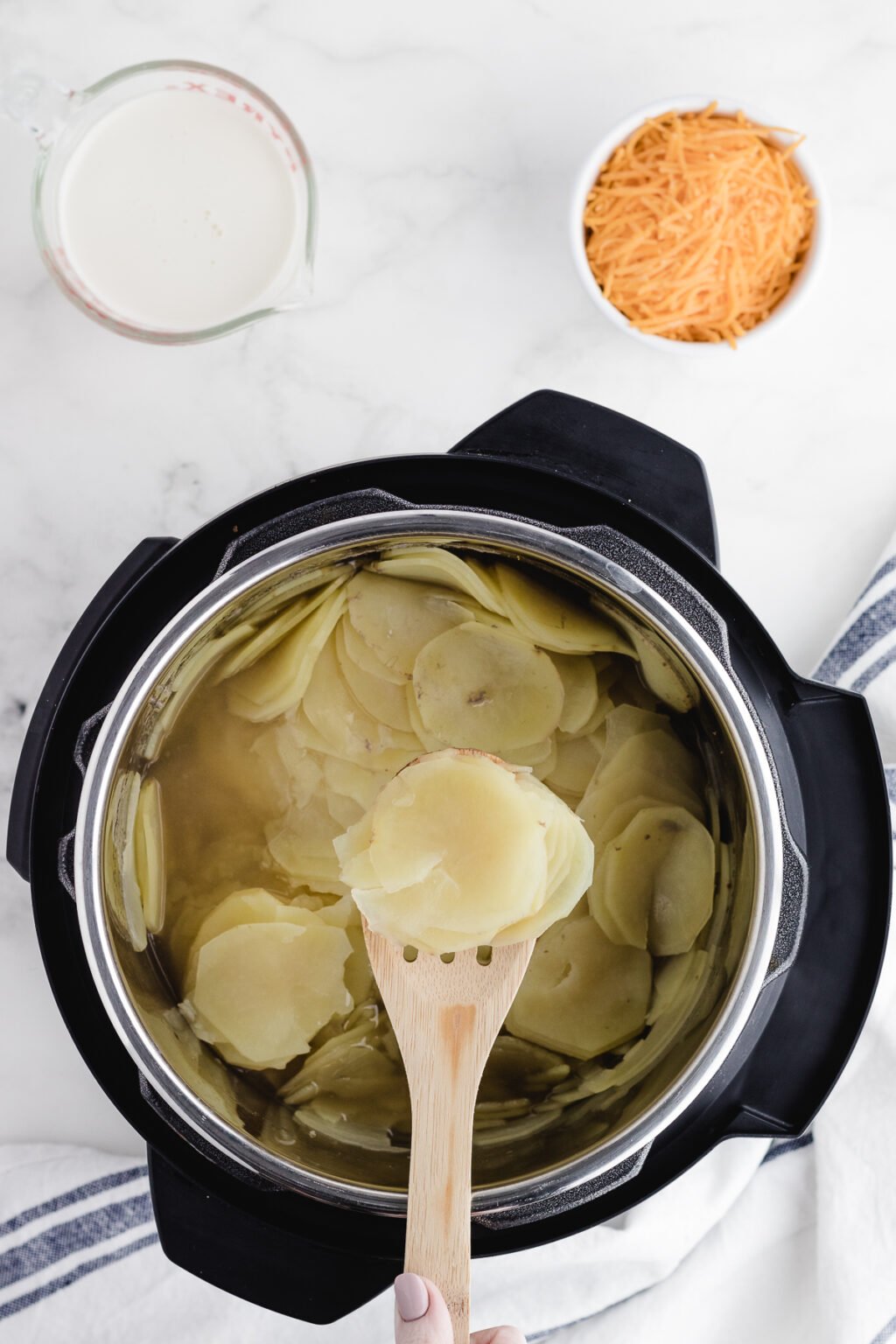 Cooking Sliced and Layered Potatoes (Instant Pot Recipe) - Whole Lotta Yum